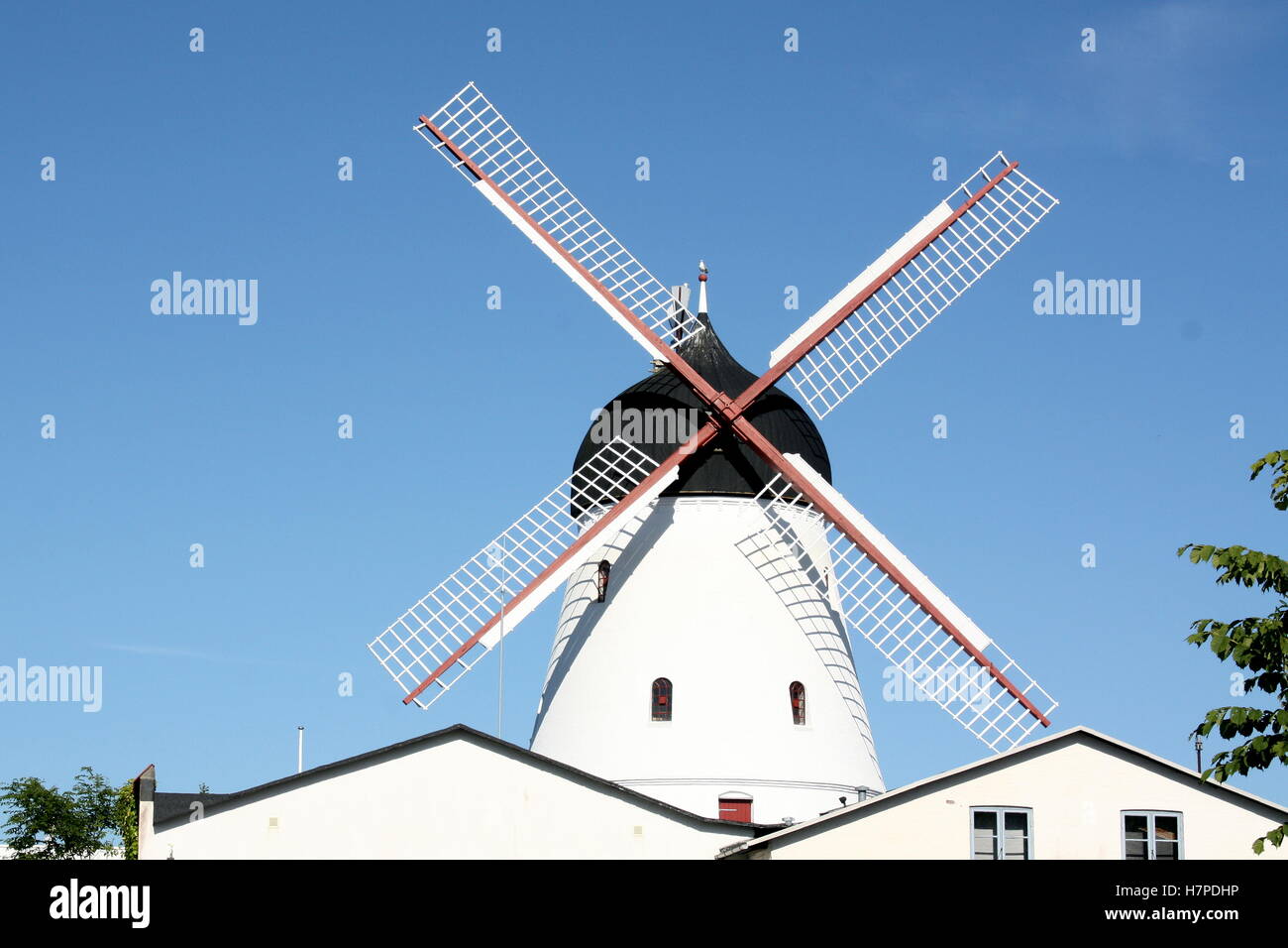 Windmill against a blue sky Stock Photo - Alamy