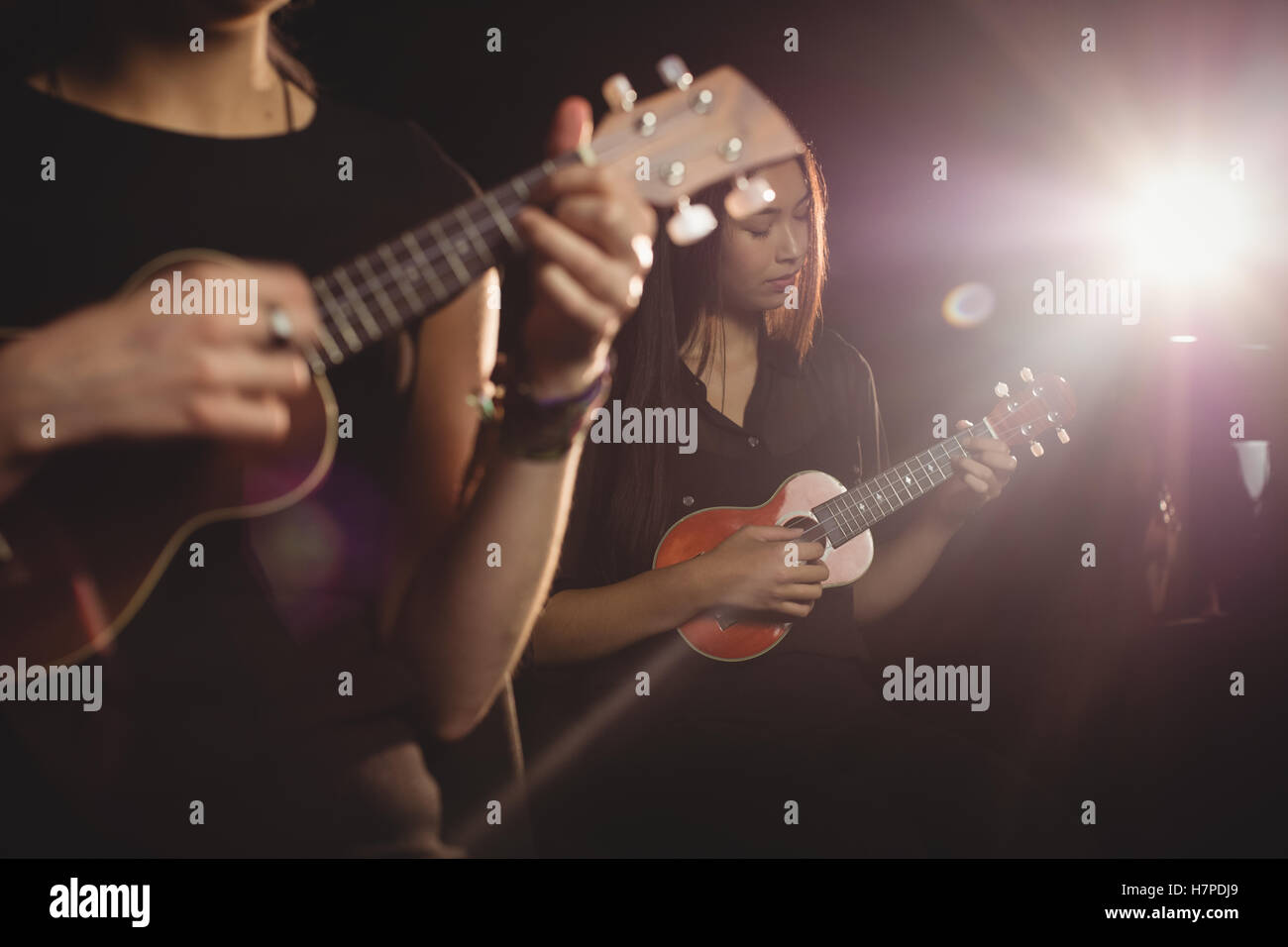 Women playing music hi-res stock photography and images - Alamy