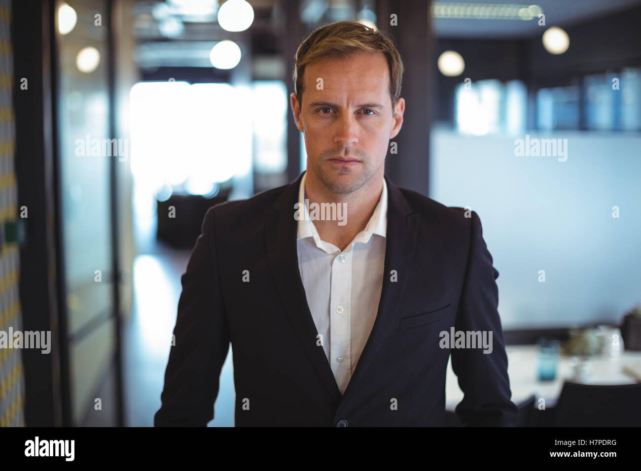 Portrait of confident businessman Stock Photo - Alamy