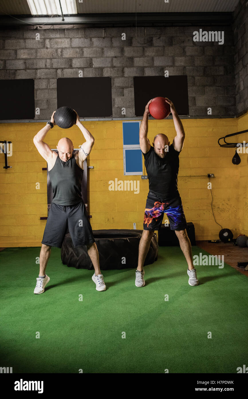 Thai boxers exercising with exercise ball Stock Photo - Alamy