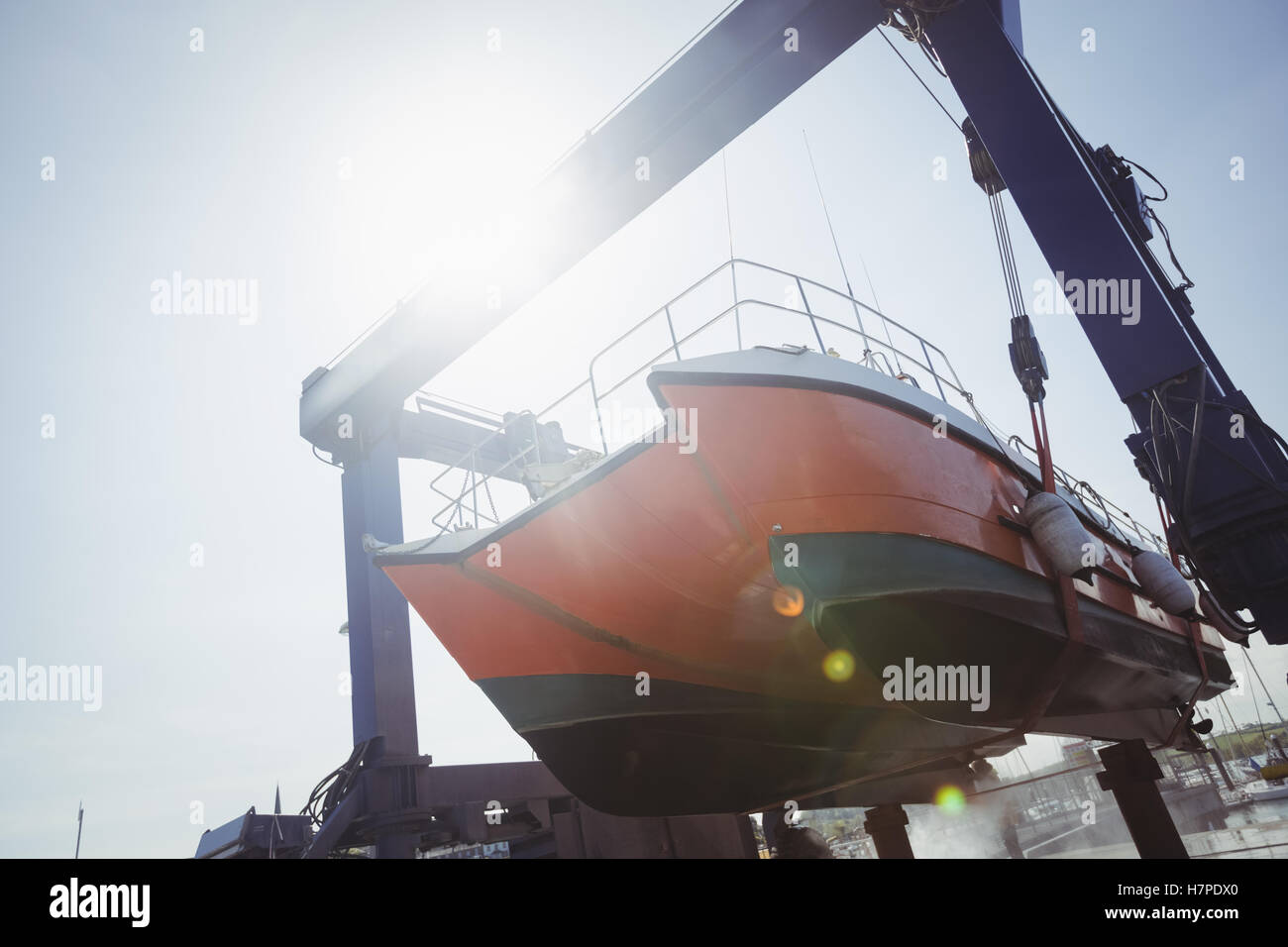 Hoist a boat hi-res stock photography and images - Alamy