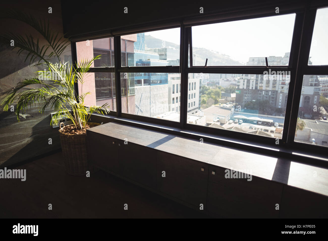 View of modern buildings through office window Stock Photo - Alamy