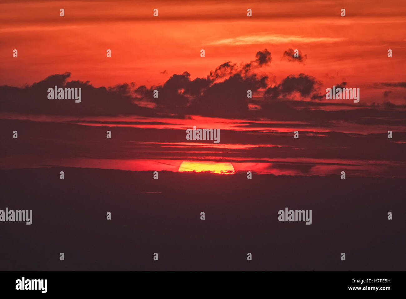 Blood-red sunset after a hot summer day Stock Photo - Alamy