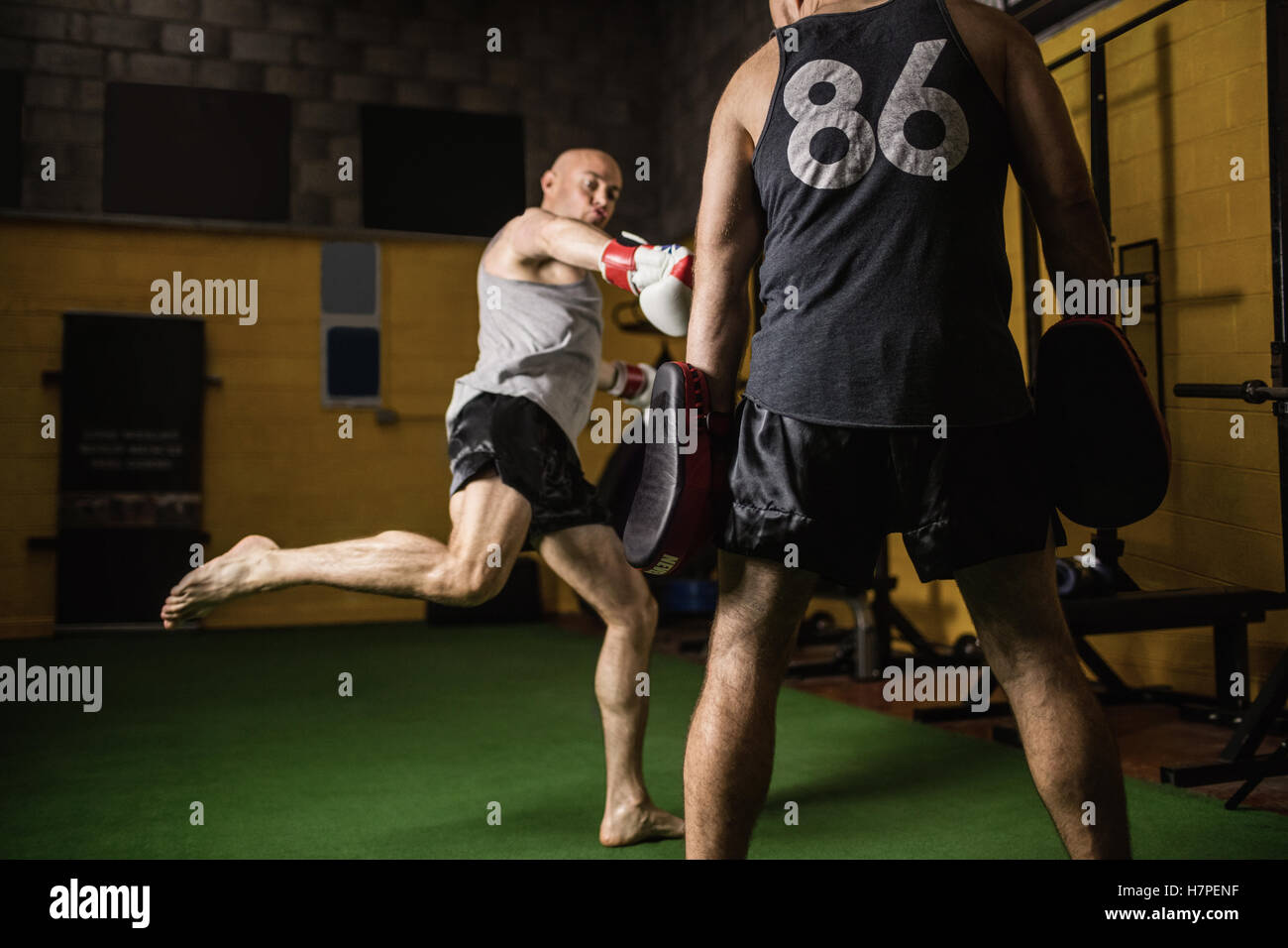 Boxers practicing boxing in the fitness studio Stock Photo - Alamy