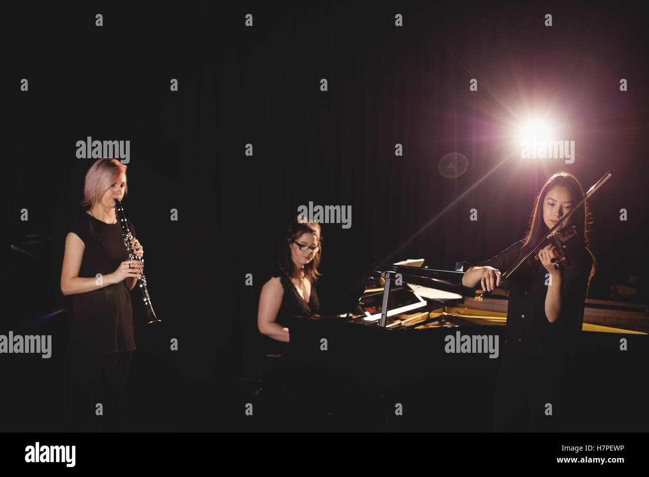 Women playing various instrument Stock Photo - Alamy