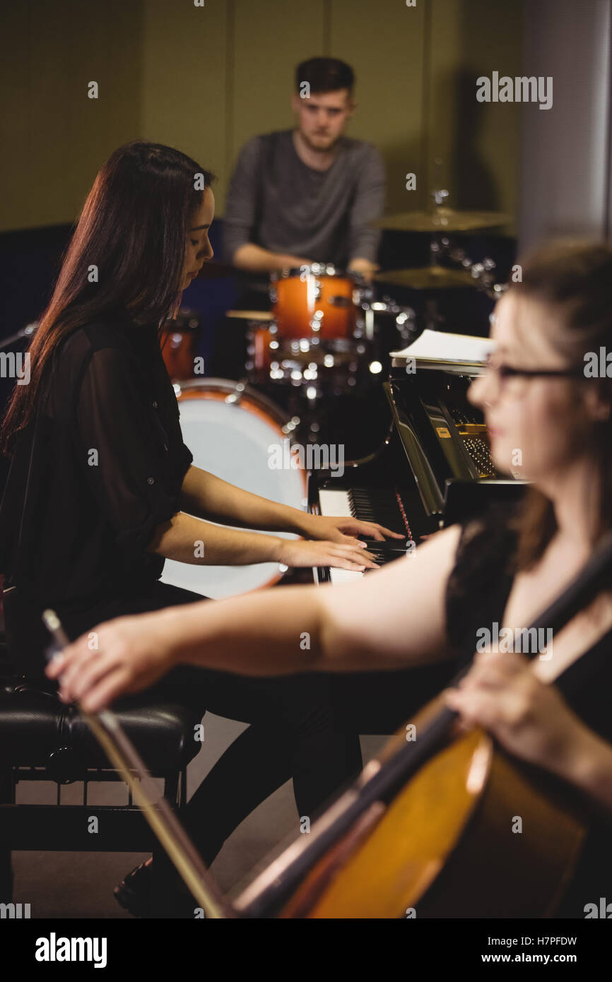 Group of students playing various instruments Stock Photo - Alamy