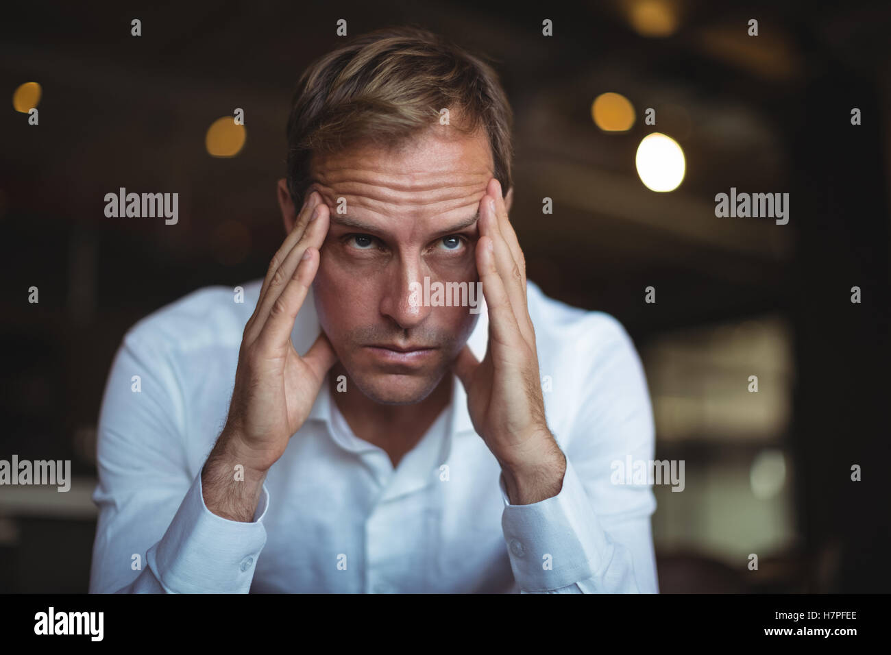 Hand on temple hi-res stock photography and images - Alamy