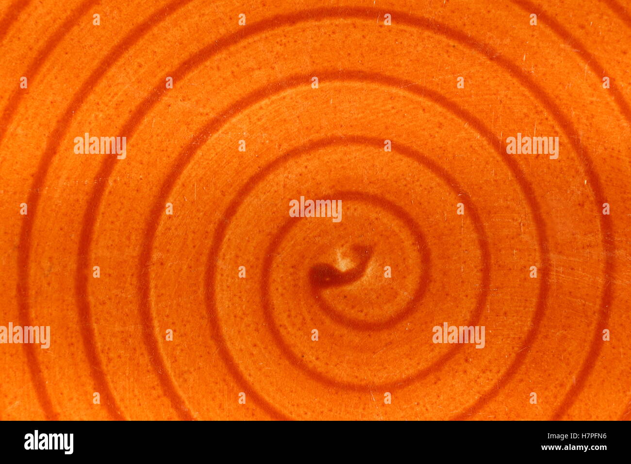 Orange varnish with spiral shape and saturated colors Stock Photo - Alamy