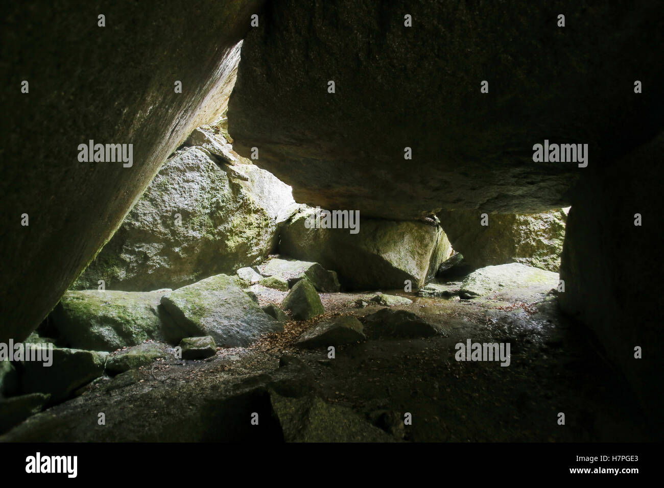 HDR image of cave under a big rock in Sweden Stock Photo - Alamy