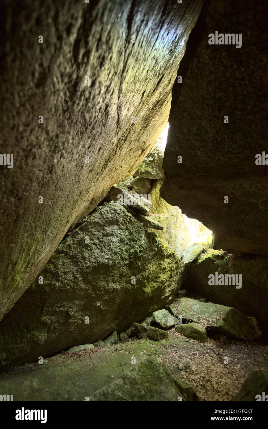 HDR image of cave under a big rock in Sweden Stock Photo - Alamy