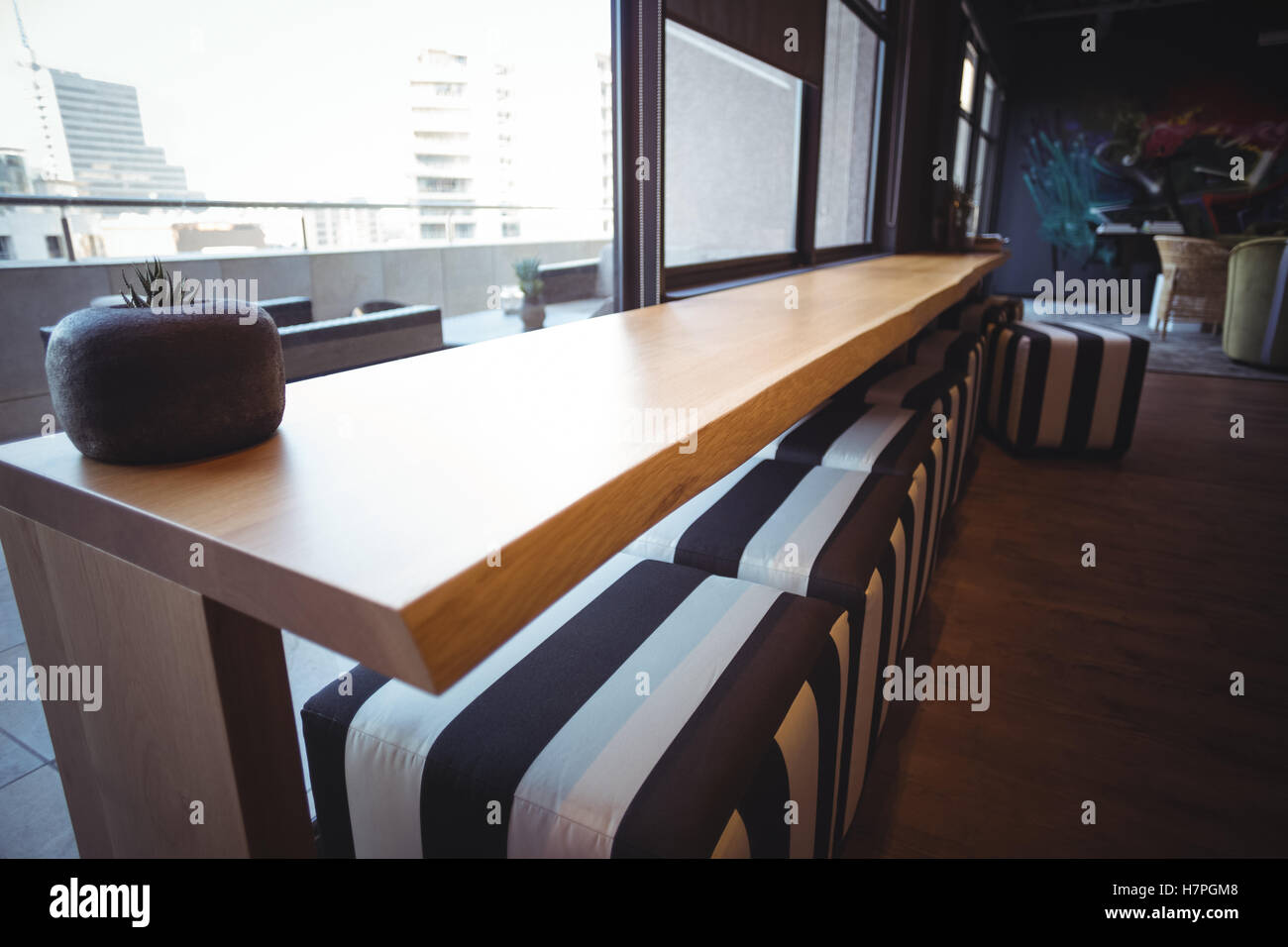 Modern table in cafeteria Stock Photo - Alamy