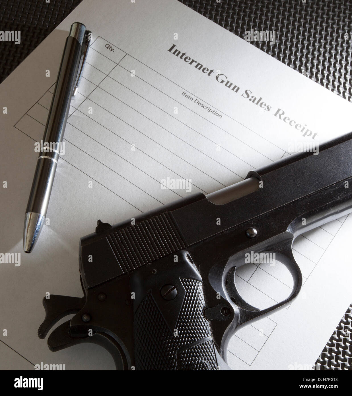 Handgun and sales receipt for a handgun sold over the Internet Stock ...