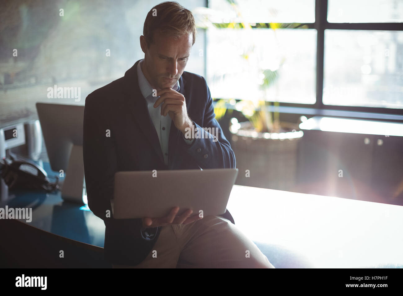 Businessman using laptop telephone hi-res stock photography and images ...