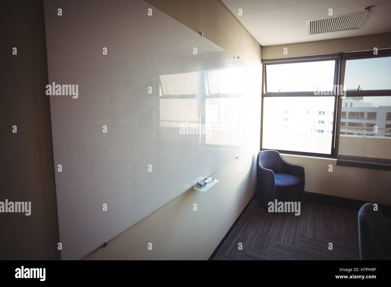 Whiteboard in meeting room Stock Photo - Alamy