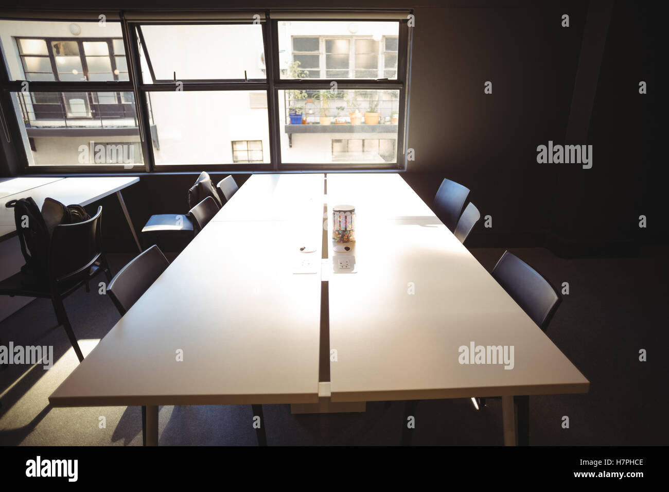 Table in office cafeteria Stock Photo - Alamy