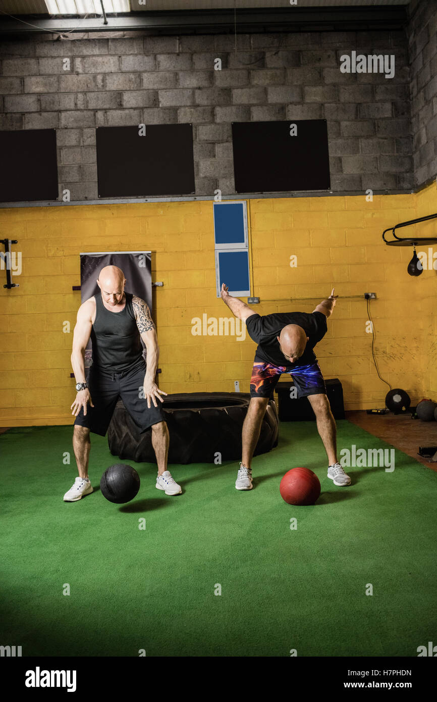 Thai boxers exercising with exercise ball Stock Photo - Alamy