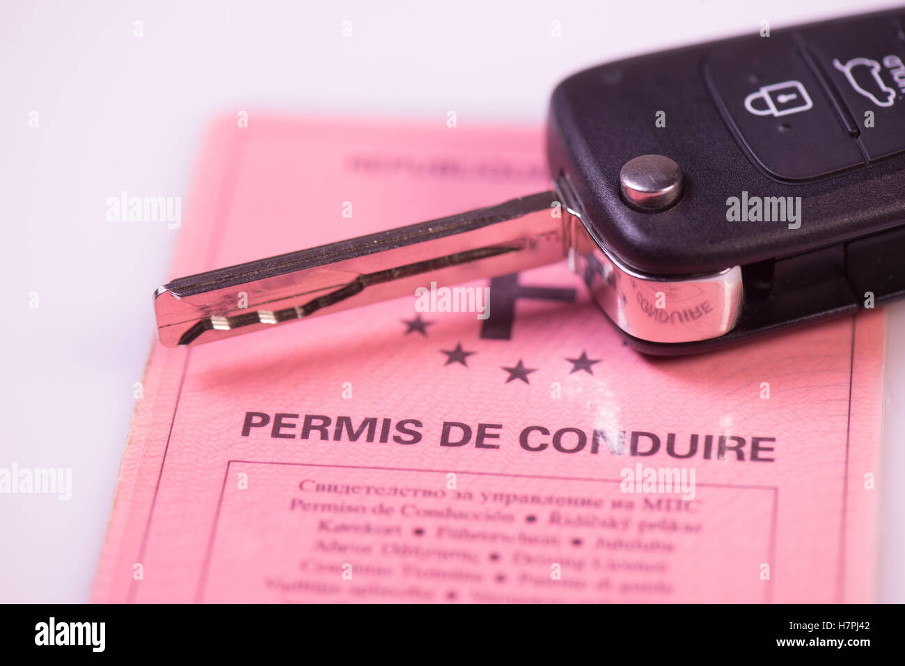 Car keys and drivers license on white background, France Stock Photo ...