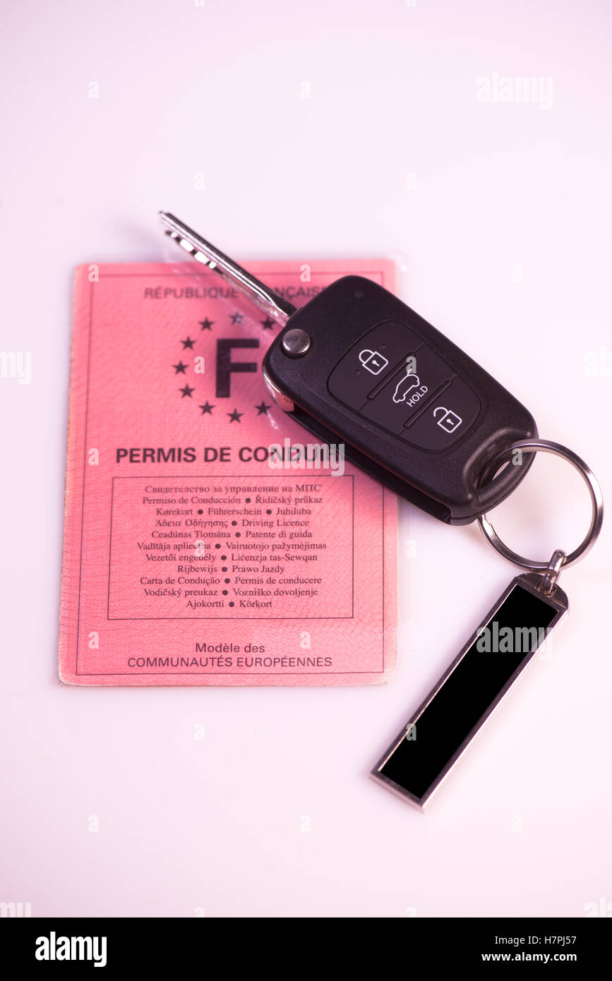 Car keys and drivers license on white background, France Stock Photo ...