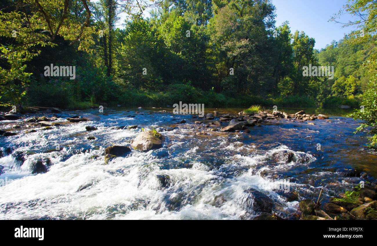 Water tumbling over boulders in Wilson Creek in North Carolina Stock ...
