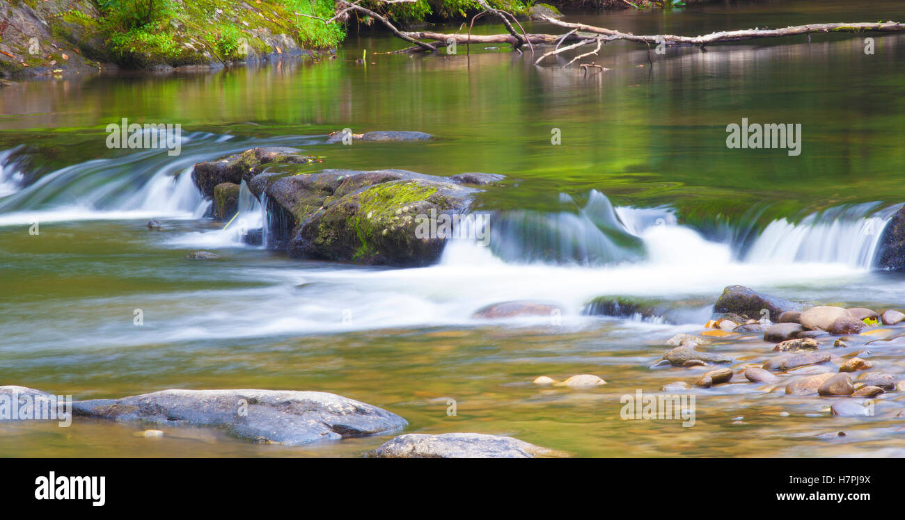 Water spilling over rocks hi-res stock photography and images - Alamy