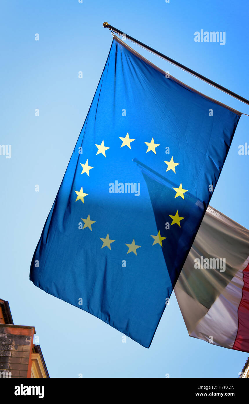 European Union and Italian flag on blue sky Stock Photo - Alamy