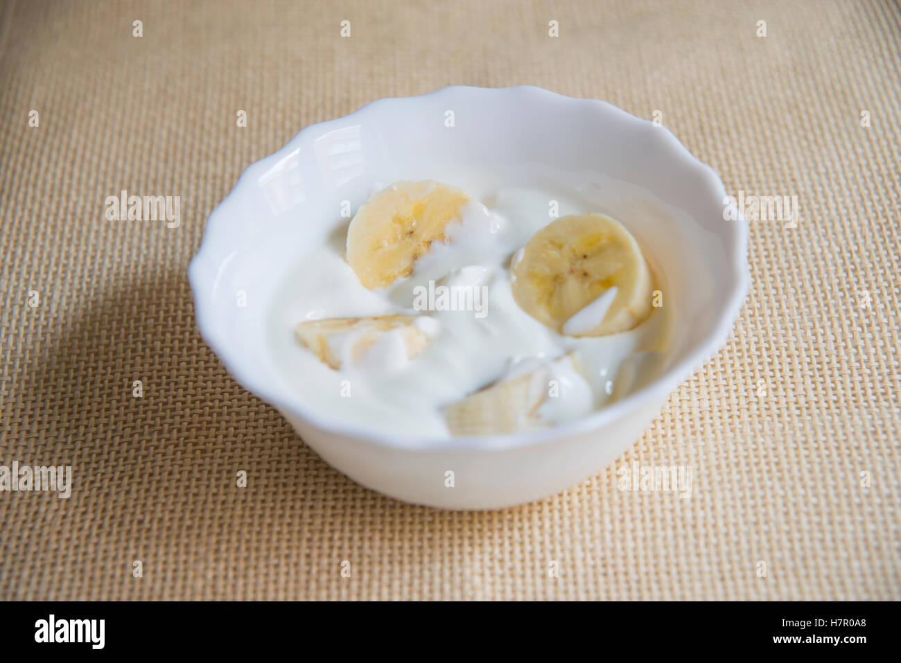 Banana with cream Stock Photo - Alamy