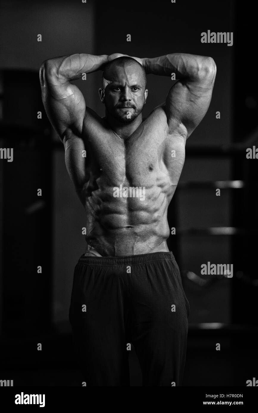 Portrait Of A Physically Fit Man Showing His Well Trained Body ...