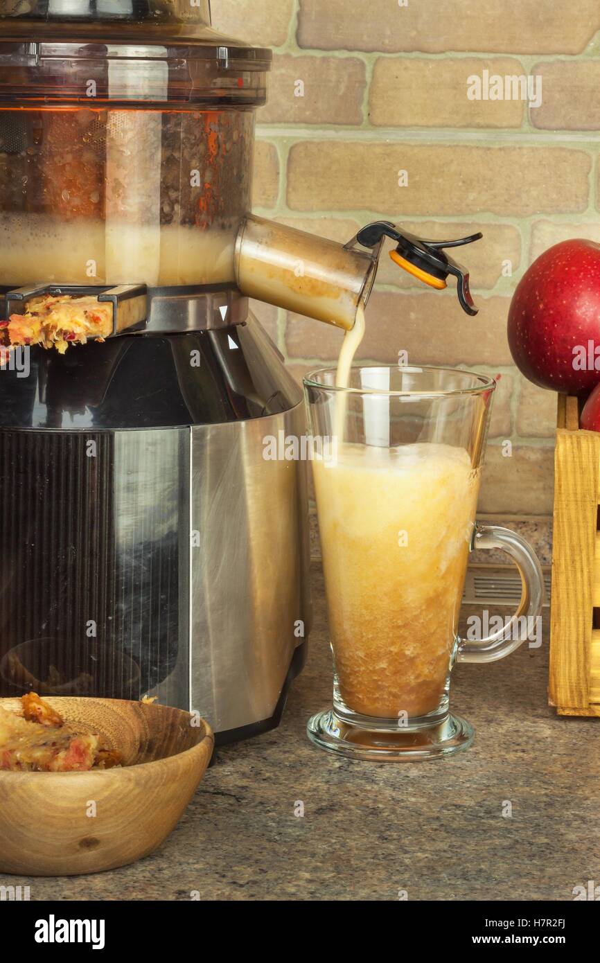 Domestic production of fresh apple juice. Fruit processing. Production ...