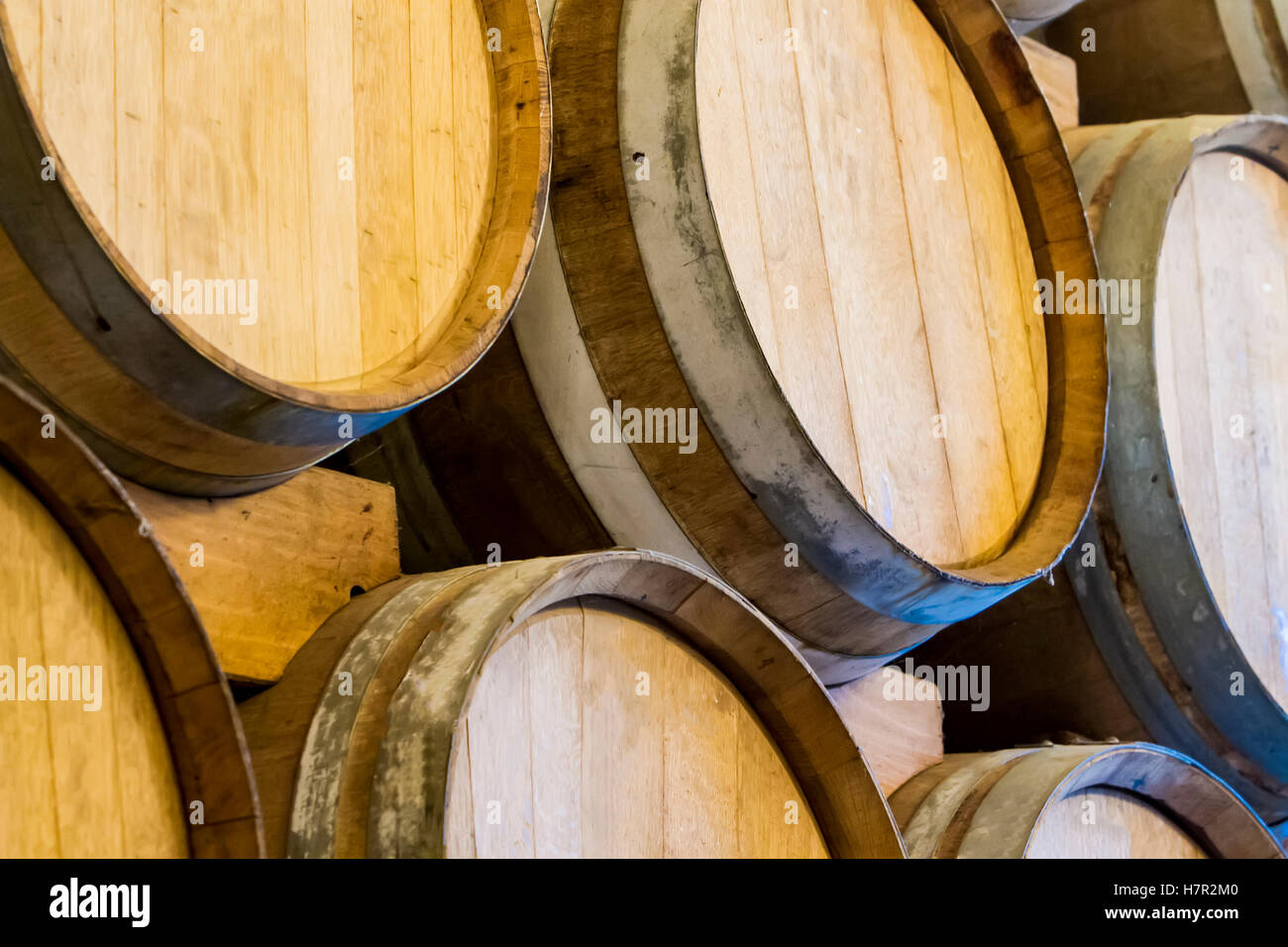 Close up view at lot of barrels in storage Stock Photo - Alamy
