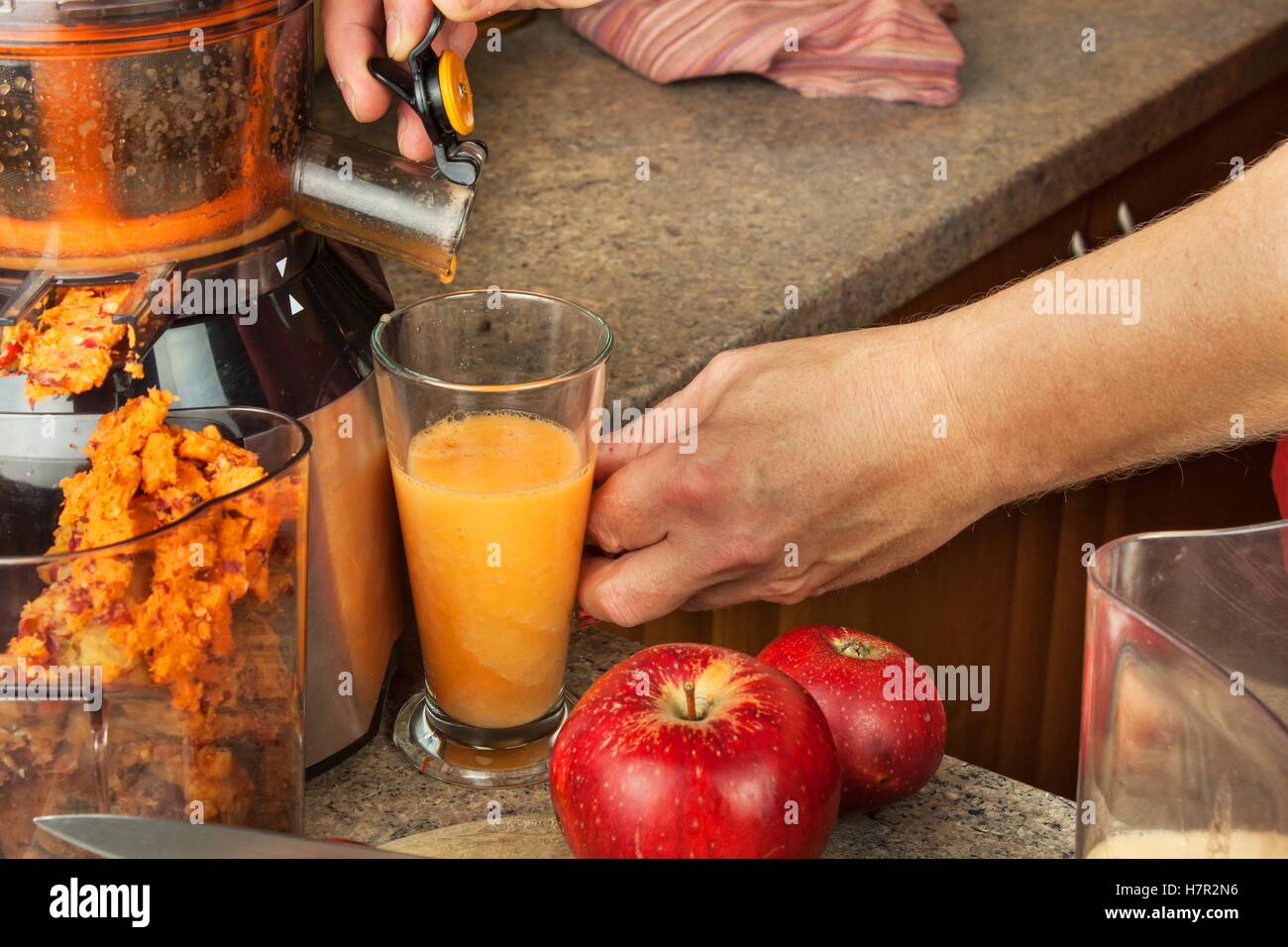 Domestic production of fresh apple juice. Fruit processing. Production ...