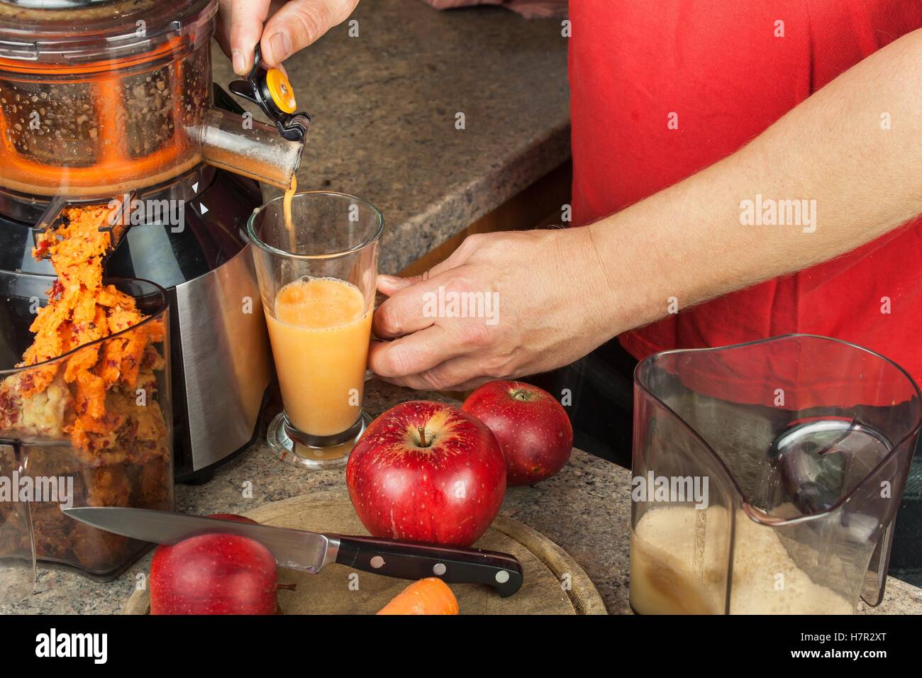 Domestic production of fresh apple juice. Fruit processing. Production ...