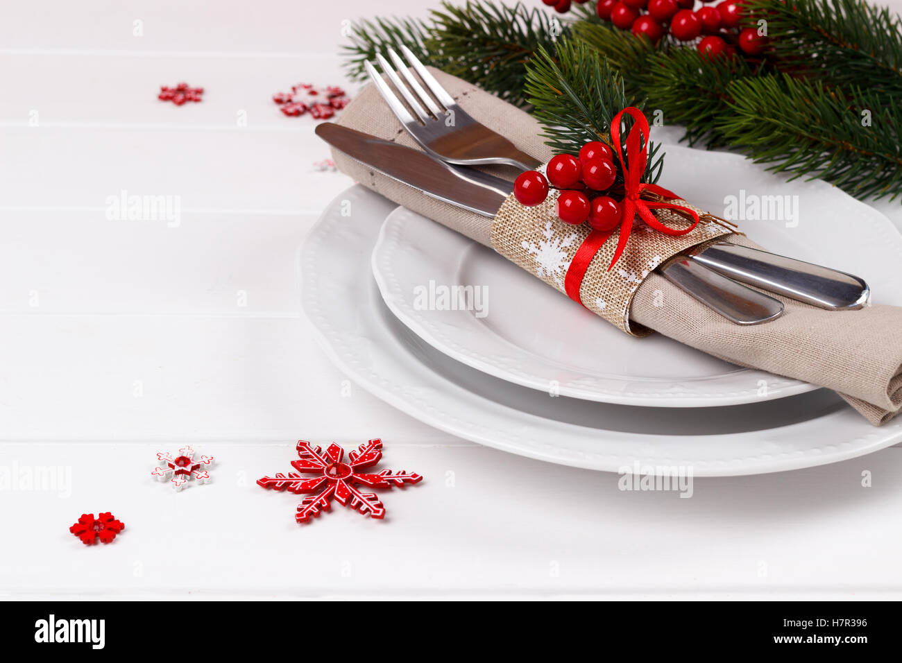 Christmas table setting on white wooden table.Christmas card template ...