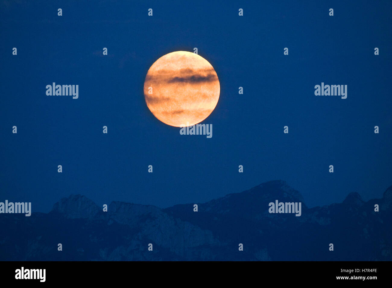 Full moon rising over mountains, Upper Bavaria, Germany Stock Photo - Alamy