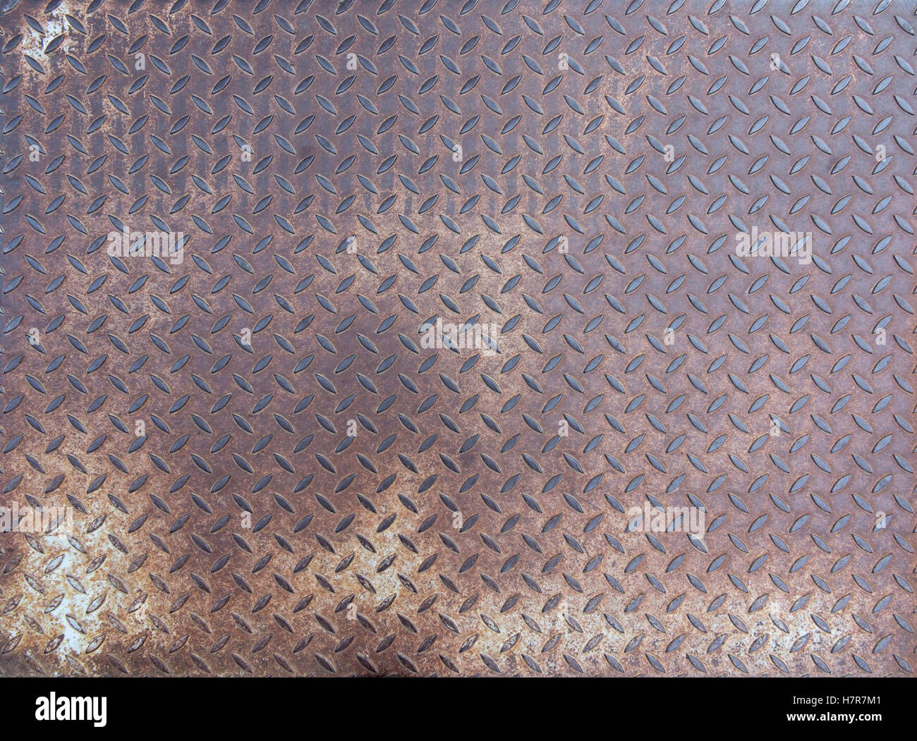 Used diamond rusty steel plate - grunge texture Stock Photo - Alamy