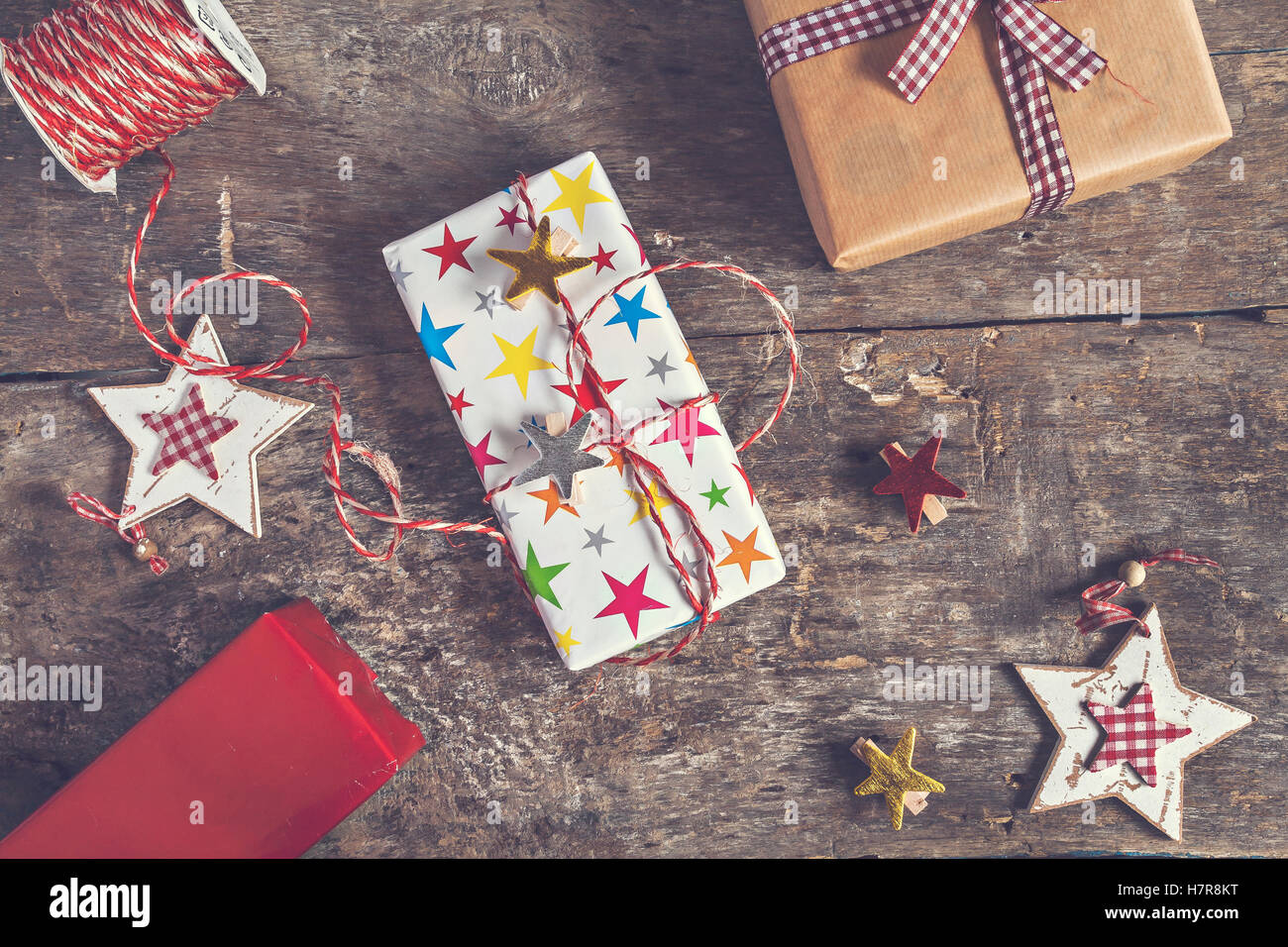 process of packing holiday gifts with effect instagram Stock Photo - Alamy