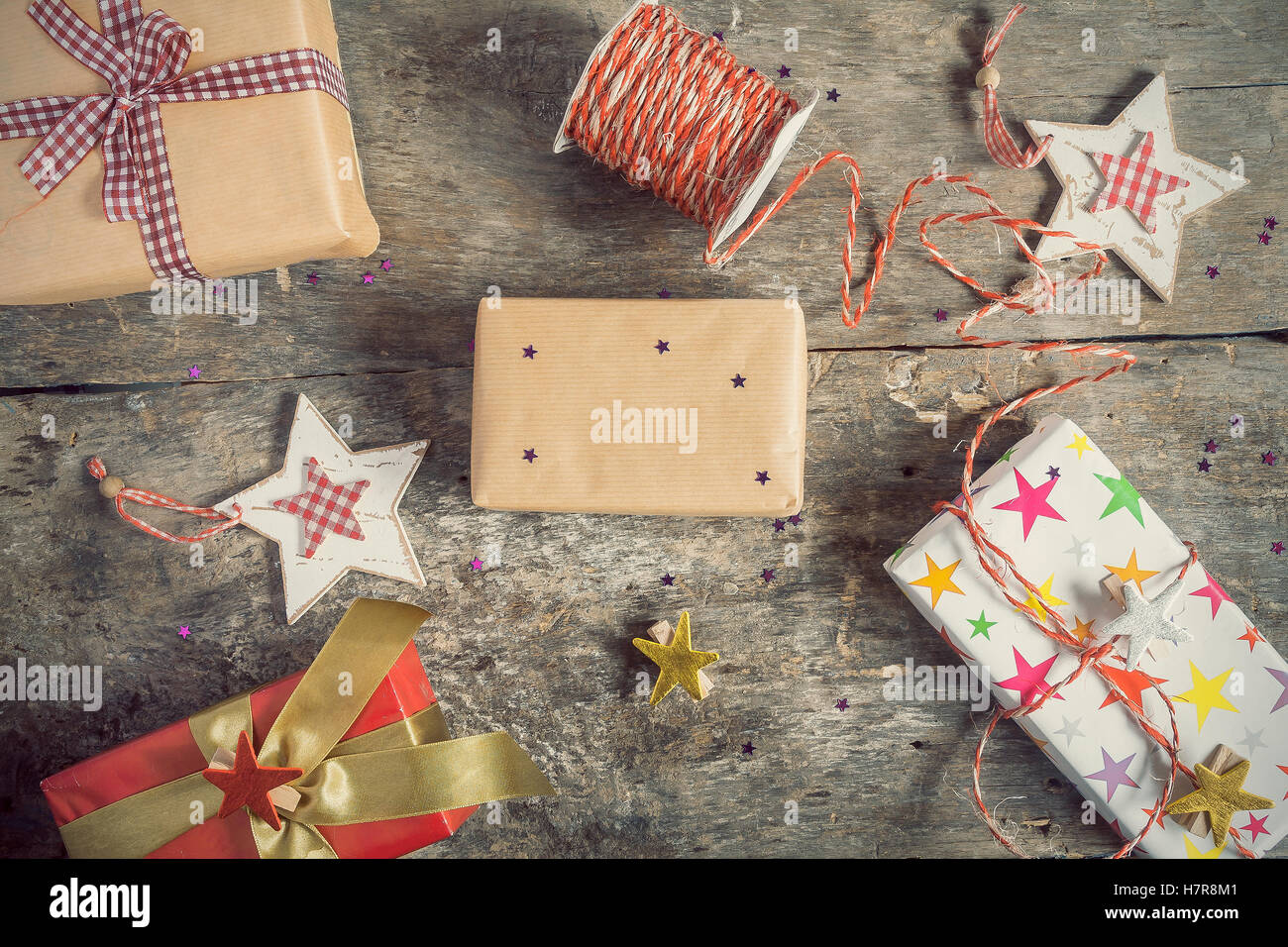 process of packing holiday gifts with effect instagram Stock Photo - Alamy