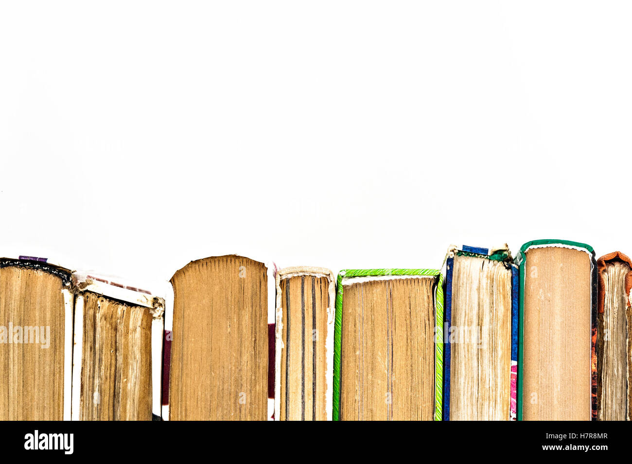 many books standing in a row isolated Stock Photo - Alamy