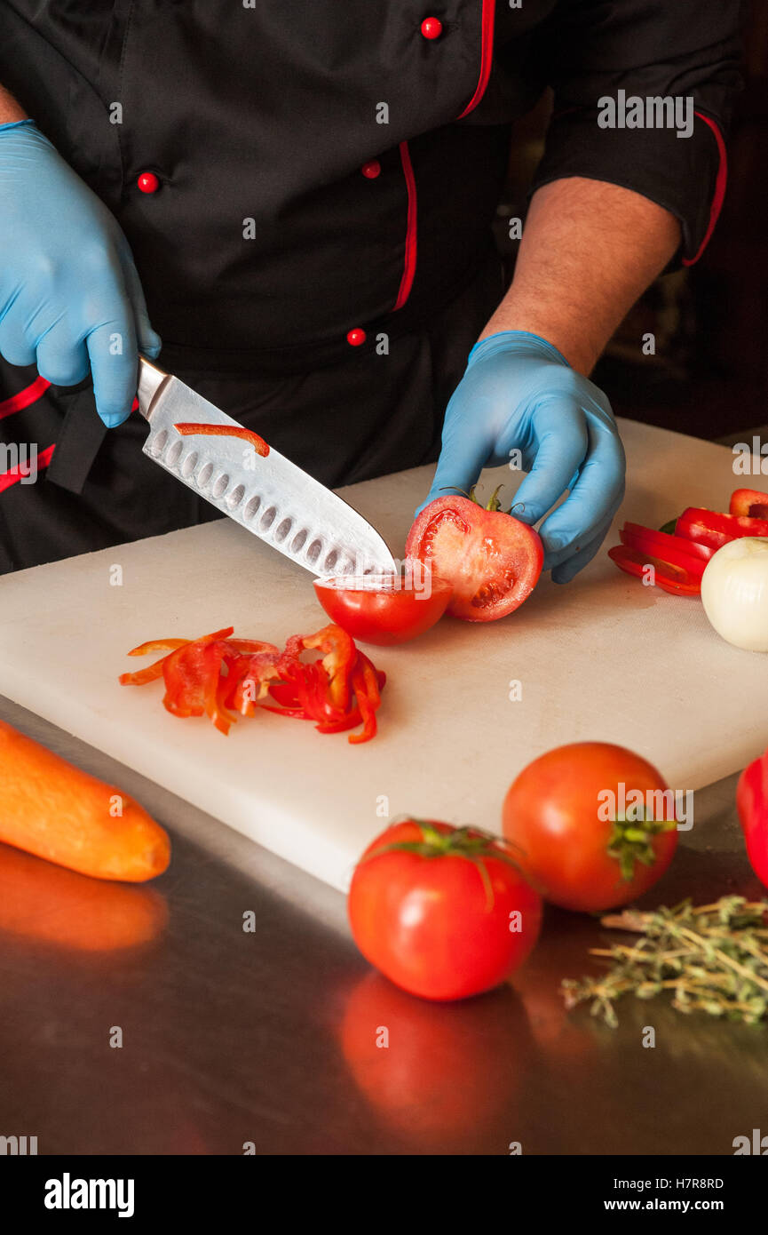 Chef cutting vegetables Stock Photo - Alamy