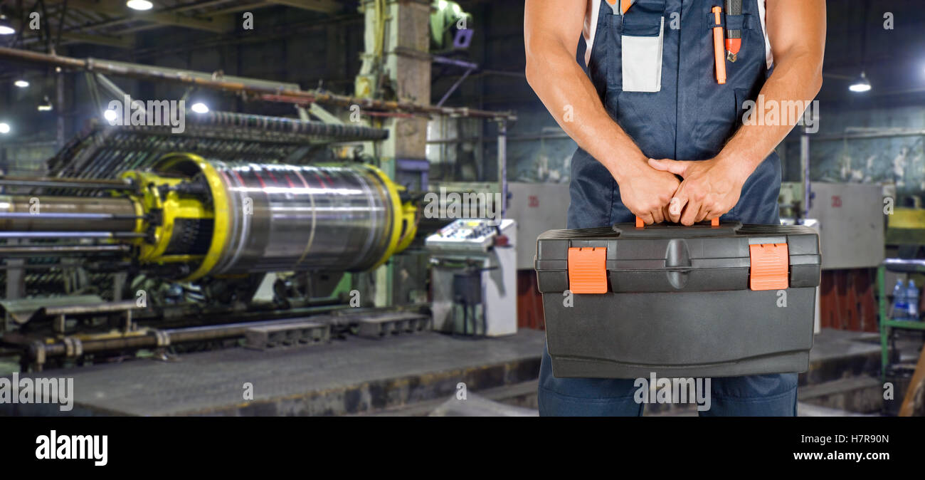 Worker with instruments Stock Photo - Alamy