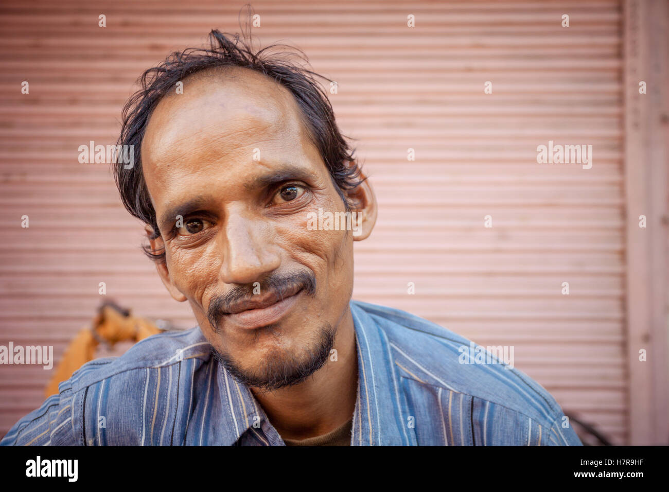 Indian man pose camera smile hi-res stock photography and images - Alamy