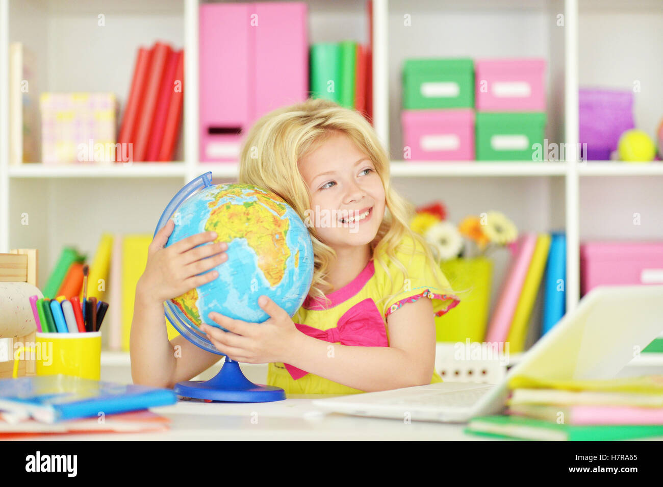 student girl with books and laptop Stock Photo - Alamy