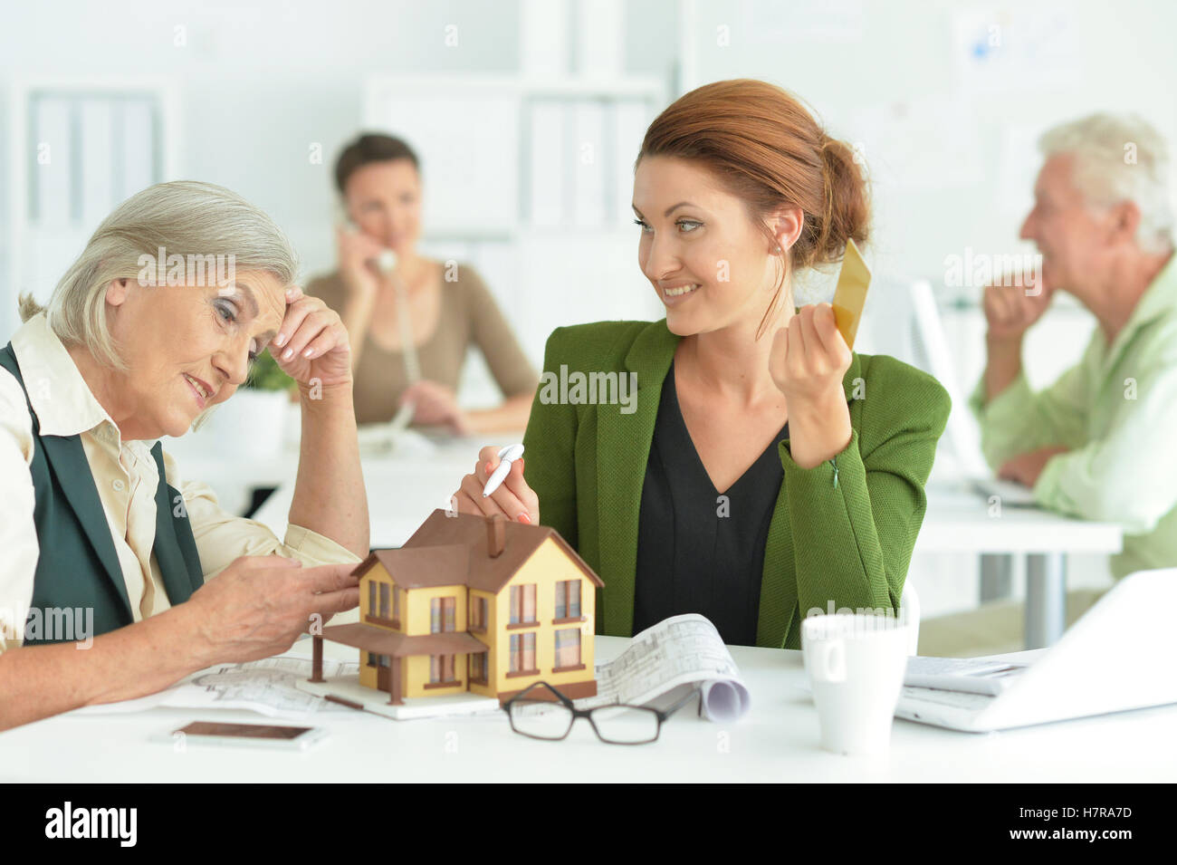 Portrait Of working house agent Stock Photo - Alamy