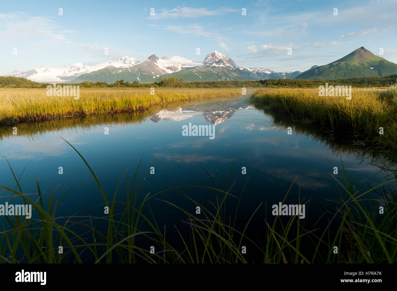 Alaska landscape with mountains reflected in the tranquil water, Katmai ...