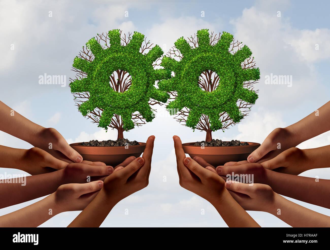 Teamwork partnership group concept as a team of hands holding a tree ...