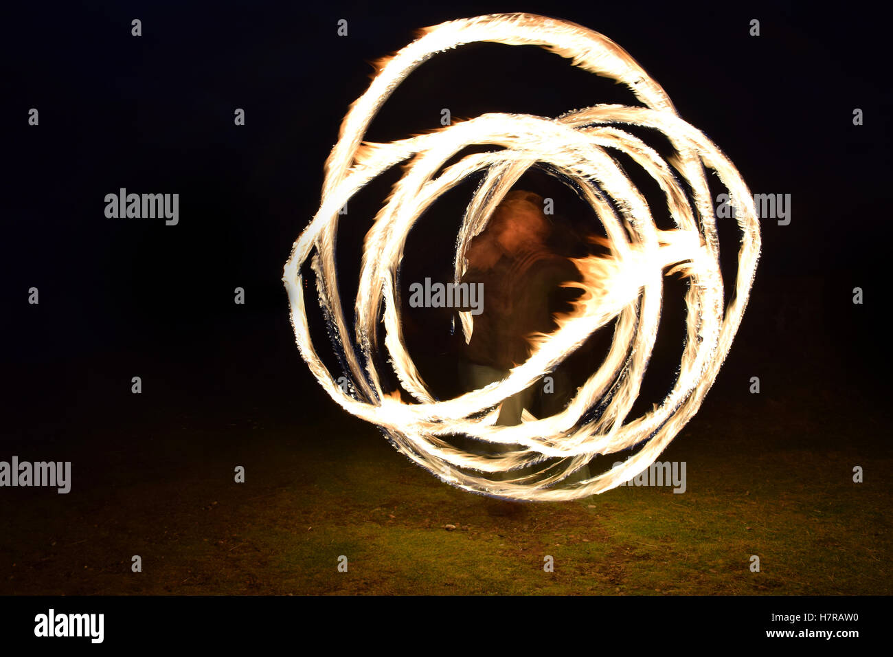 Man fire spinning poi hi-res stock photography and images - Alamy