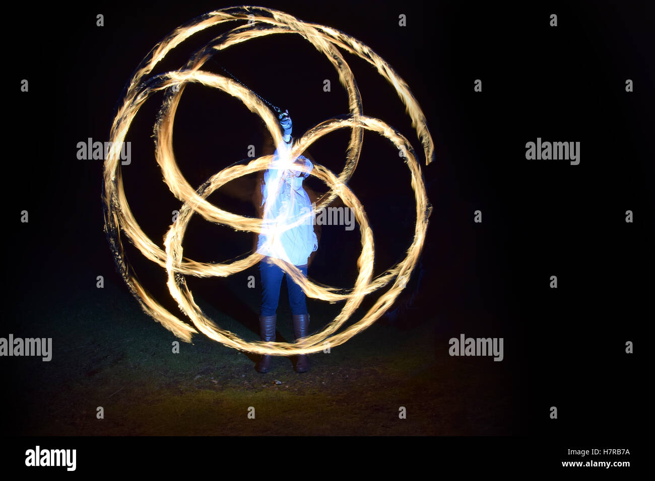 Poi spinning woman hi-res stock photography and images - Alamy