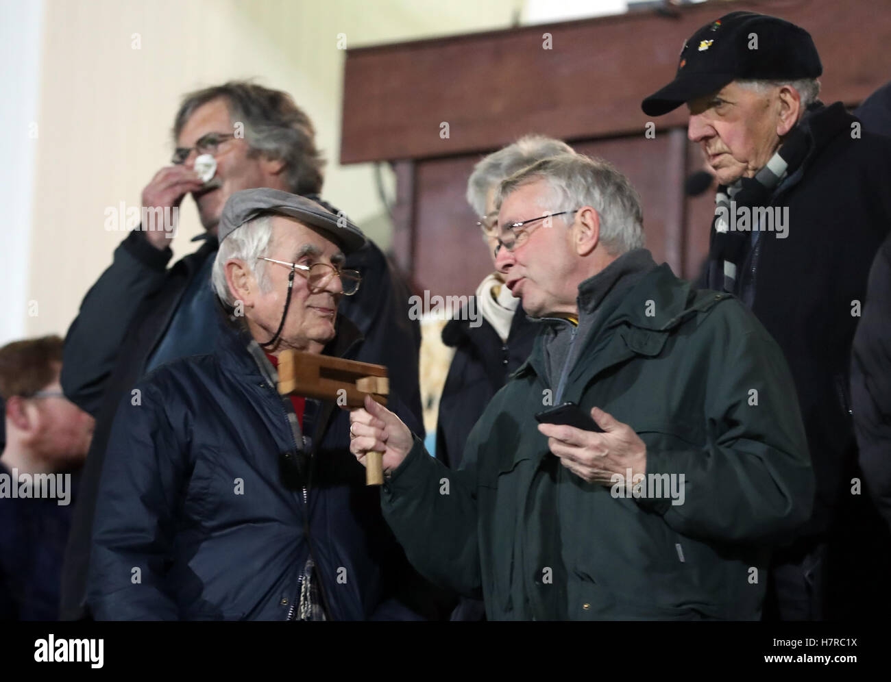 A fan with a wooden rattle in the stands before the Emirates FA Cup ...