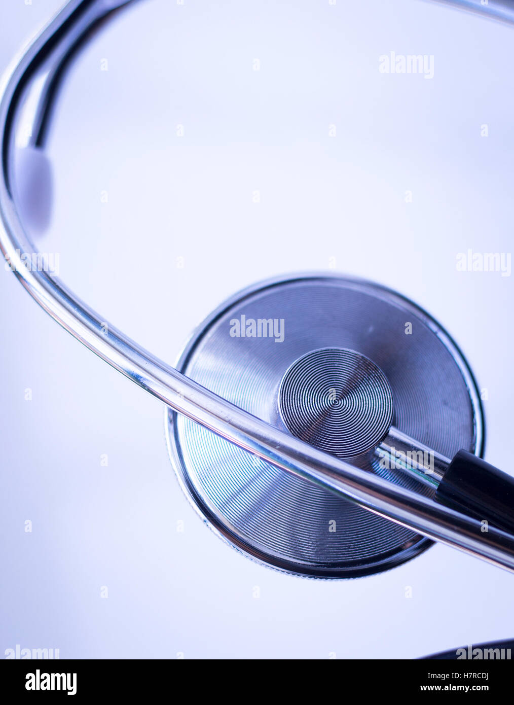 Medical doctor's stethoscope used to listen to patient heart rate ...