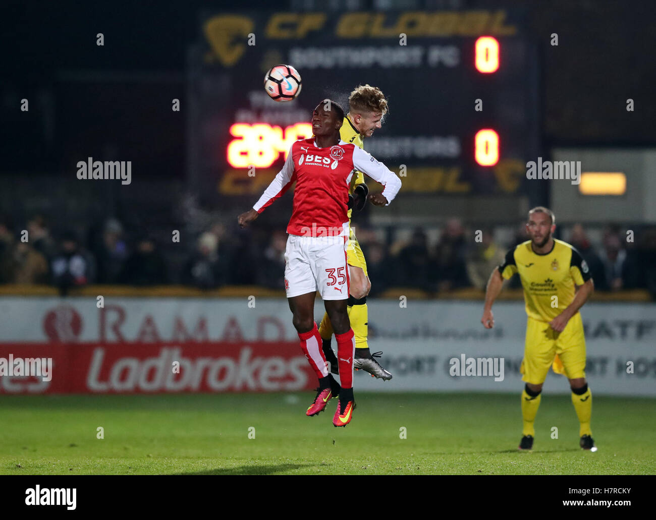 Southport's James Caton (right) and Fleetwood Town's Ekpolo Godswill ...