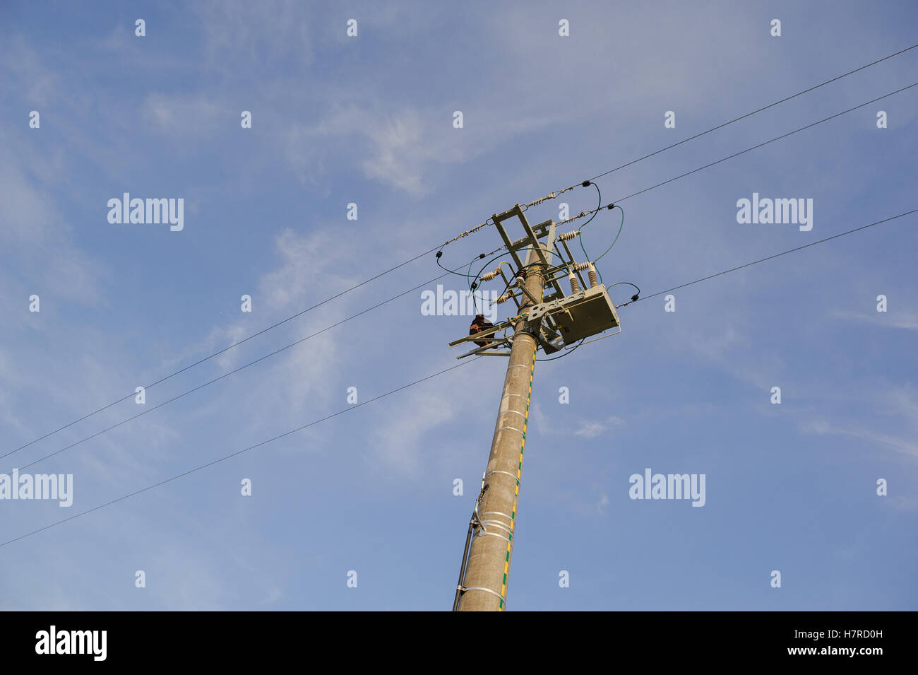high voltage electrical pole structure on the meadow Stock Photo - Alamy